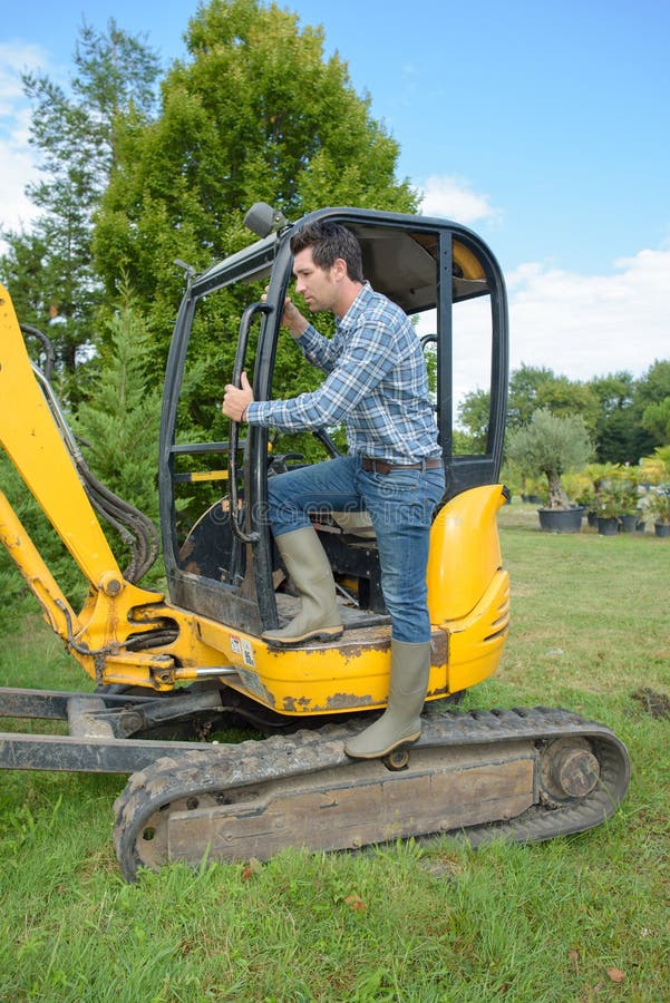 Man Stood in Doorway Digger Stock Image - Image of tracks, field: 86206027