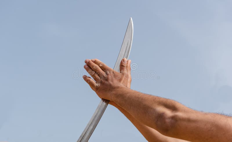 Man Stops Sword with Two Hands Stock Image - Image of history, fight ...