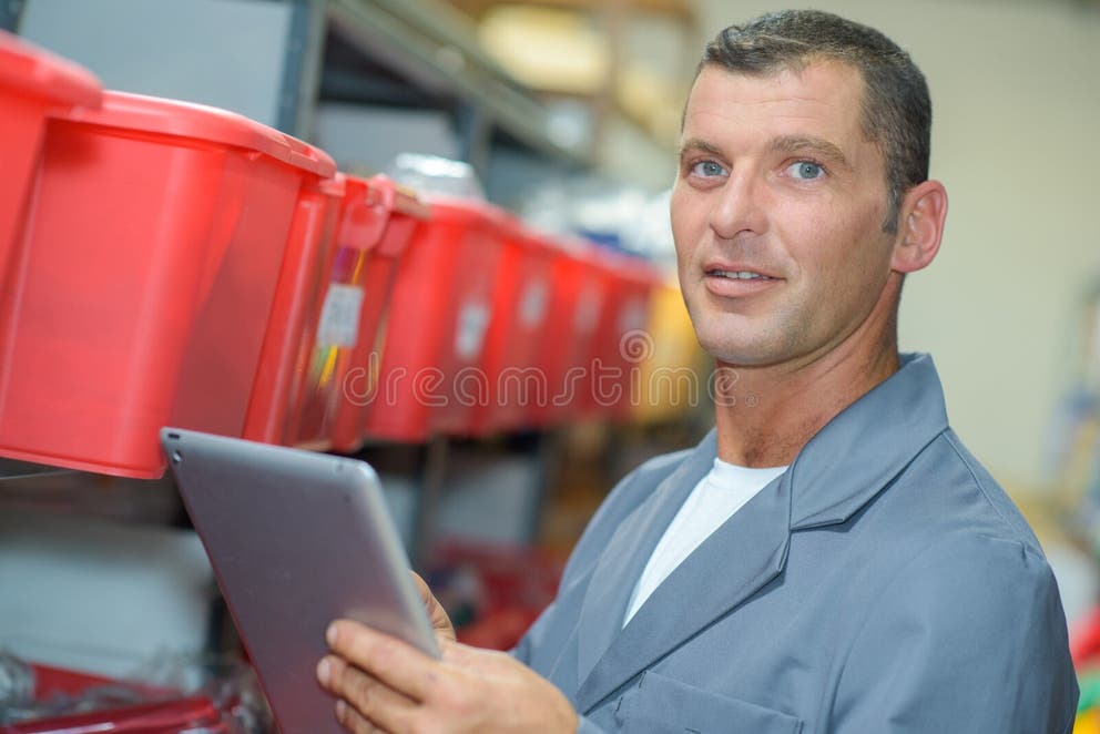 Man in Storeroom with Tablet Stock Image - Image of storage, inventory ...