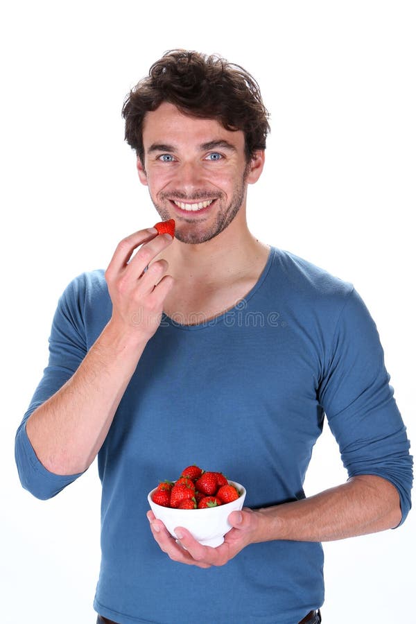 Man with strawberries stock image. Image of happy, blue - 34038809
