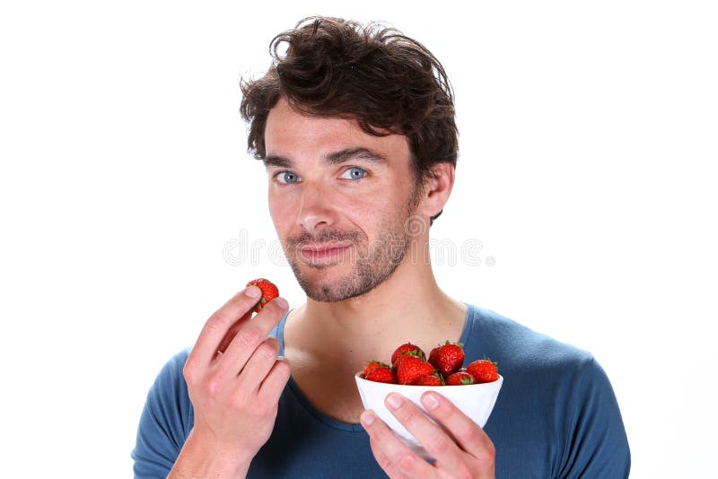 Man with strawberries stock image. Image of food, fruit - 34038719