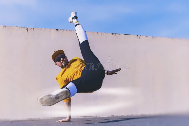 Man Street Break Dancer is Dancing in the Street. BBOY Makes an ...