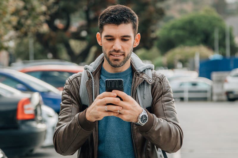 Man in the Street with Mobile Phone Stock Image - Image of photogenic ...