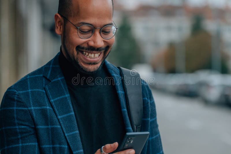 Man in the Street with Mobile Phone Stock Image - Image of looking ...
