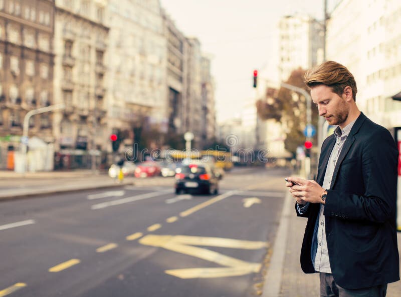 Man on the Street with Mobile Phone Stock Photo - Image of city ...