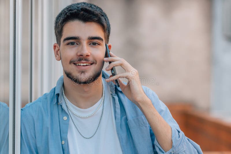 Man on the Street Talking on Mobile Phone Stock Photo - Image of city ...