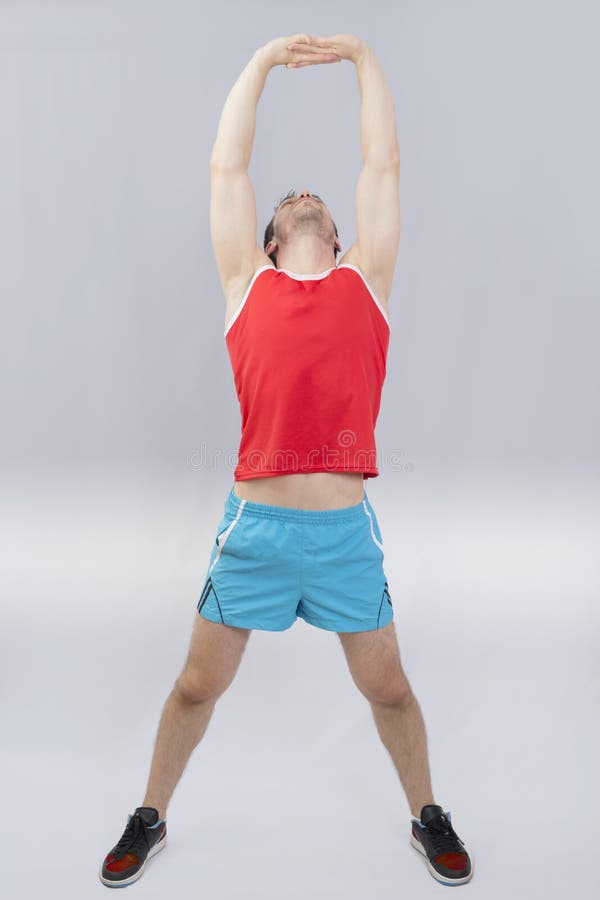 Man stretch stock photo. Image of athlete, background - 57832600