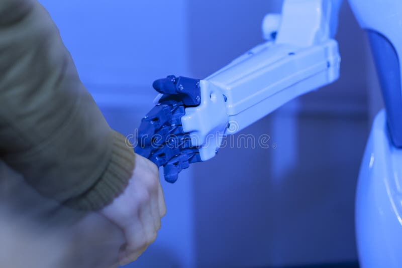Man Stretches His Hand on the Stylish Handsome Cyborg Hand, Robot and ...