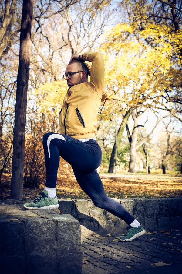 Man Stretching Arms. Exercise in Nature. Stock Image - Image of sport ... Man Stretching Arms. Exercise in Nature. Stock Image - Image of sport ...