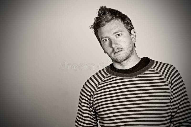 Man in striped shirt stock photo. Image of monotone, serious - 7283412