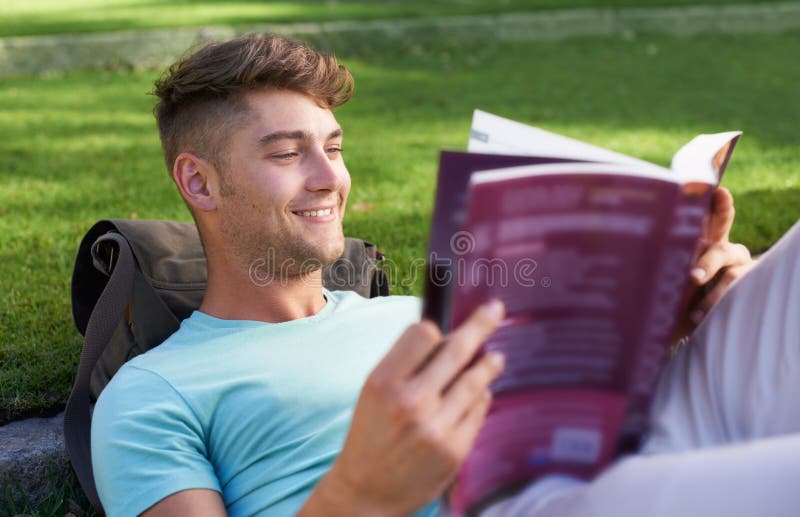 Man, Student and Book on Grass for Reading, Smile and Ideas with ...