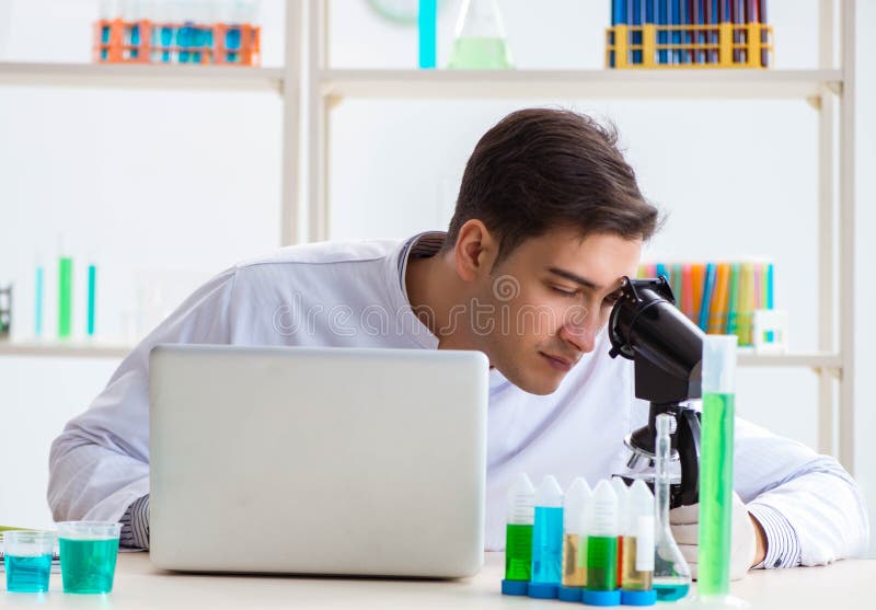 Man Student Working in Chemical Lab on Experiment Stock Photo - Image ...