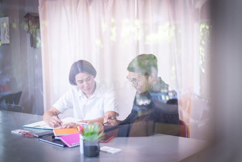Man Students Do Homework and Reports,studying with Tutor Stock Photo ...