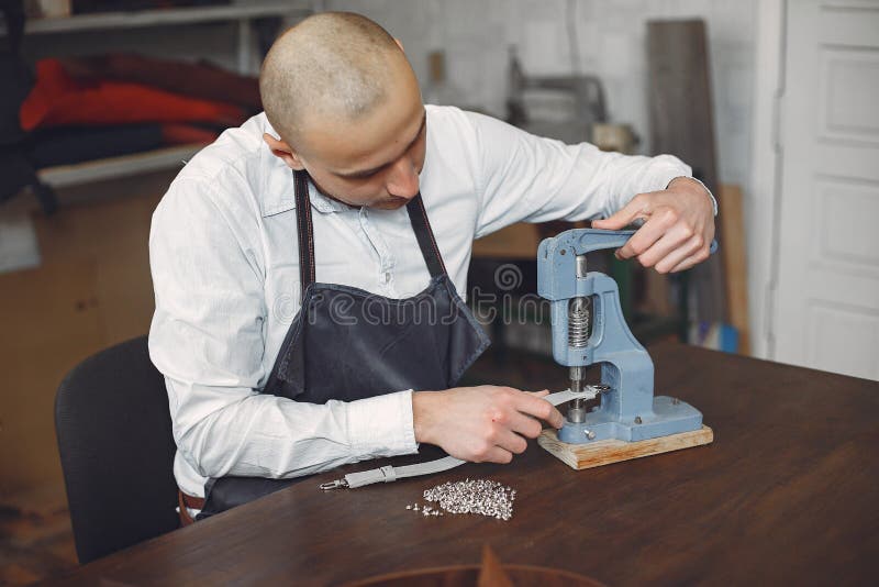 Man in a Studio Creates Leather Ware Stock Image - Image of ...