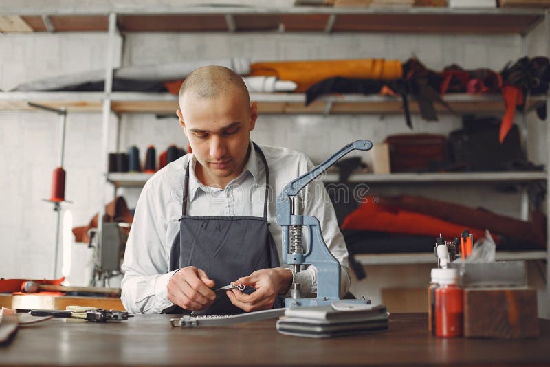 Man in a Studio Creates Leather Ware Stock Photo - Image of master ...