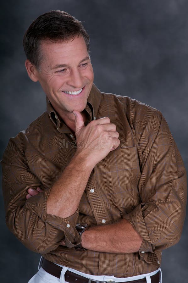 Man in a Studio Portrait stock photo. Image of smile - 25822700