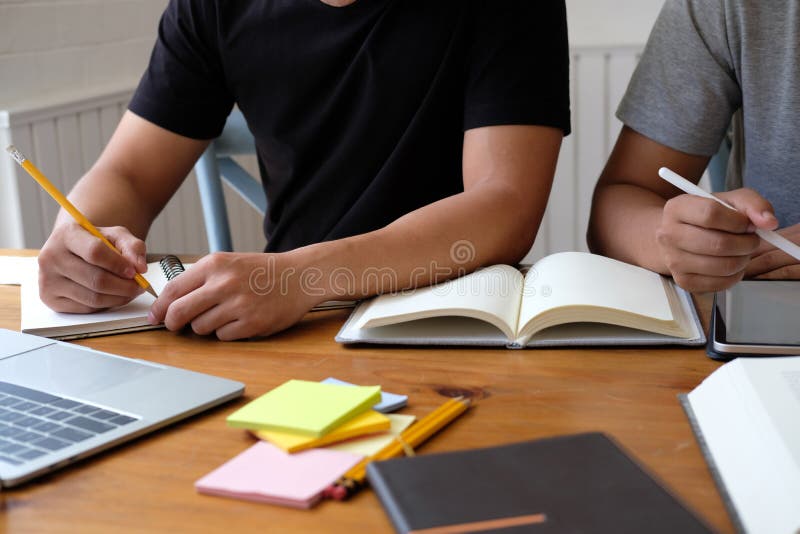 Man Studying with Graphic Tablet. College Student Learning Taking Note ...