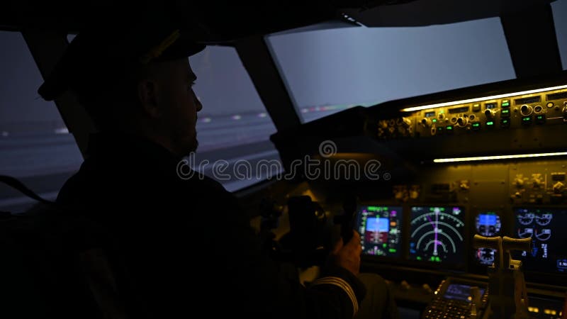 A Man is Studying To Be a Pilot in an Aircraft Simulator. Stock Video ...