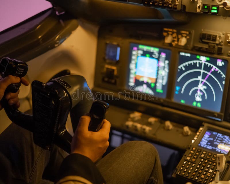 A Man is Studying To Be a Pilot in a Flight Simulator. Close-up of Male ...