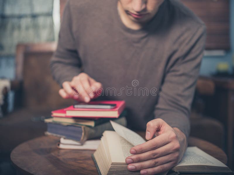 Man Studying and Using Smart Phone at Home Stock Image - Image of house ...