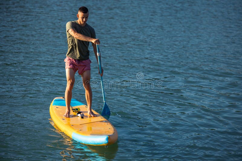 Man on Sub Board Floating on Ocean Sea. Stock Photo - Image of male ...