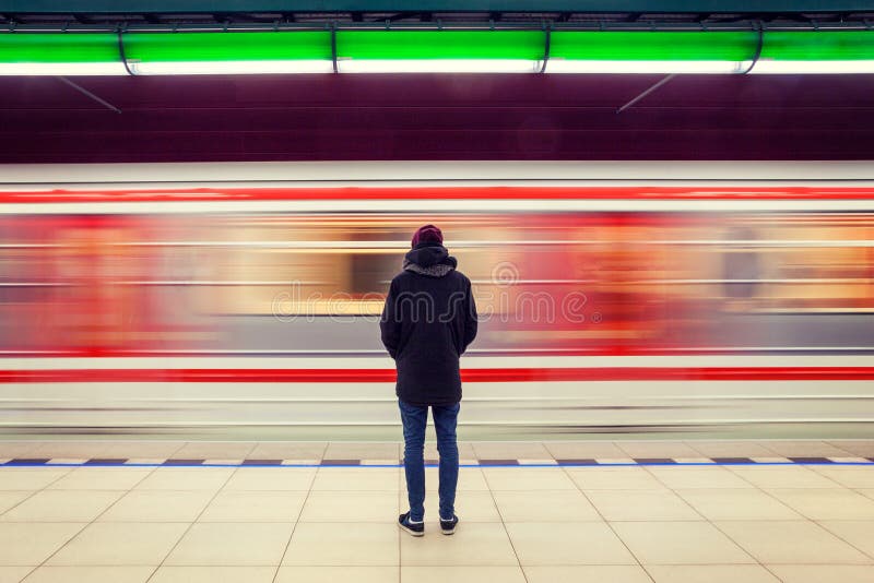 Man at Subway Station and Moving Train Stock Photo - Image of stop ...