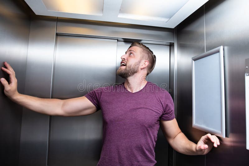 Man Woman Stuck Elevator Stock Photos - Free & Royalty-Free Stock ... Man Woman Stuck Elevator Stock Photos - Free & Royalty-Free Stock ...