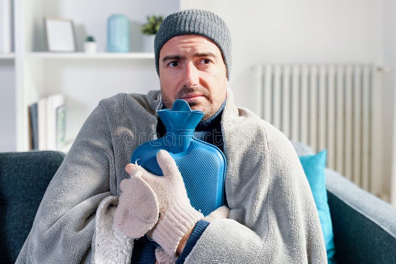 Man Suffering Cold at Home and Problem with House Heating Stock Image ...