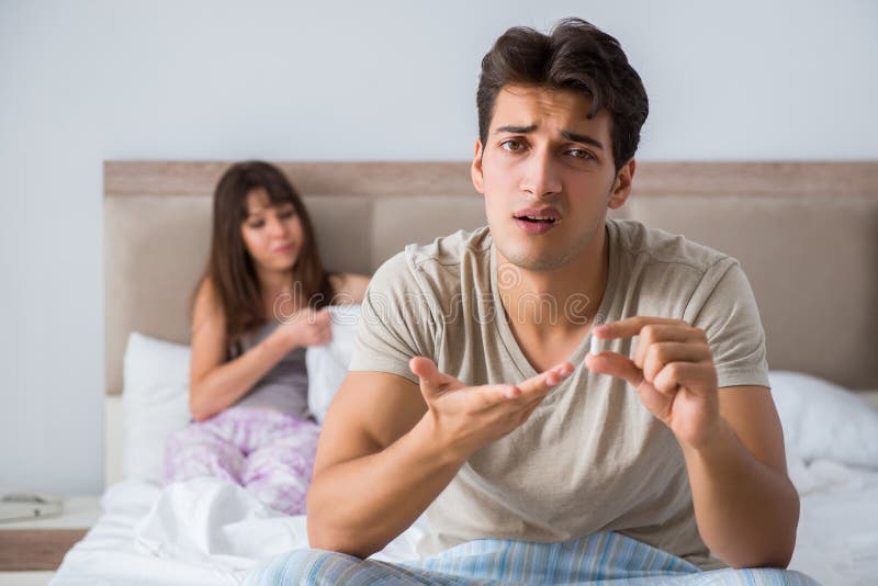 The Man Suffering from Impotency with Pill Stock Image - Image of ...
