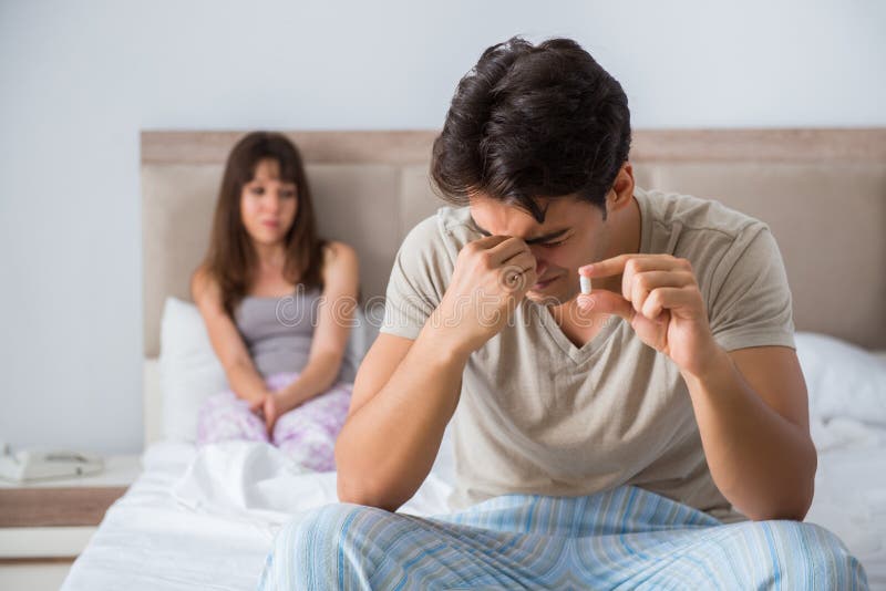 The Man Suffering from Impotency with Pill Stock Image - Image of ...
