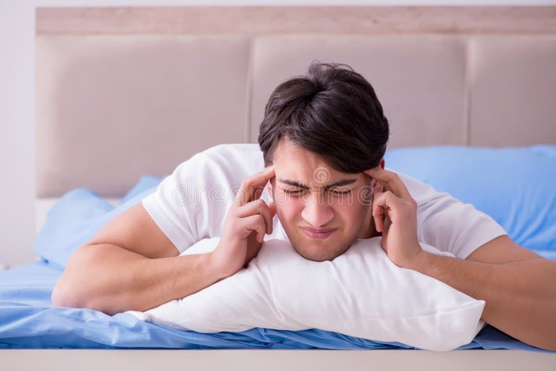 The Man Suffering from Insomnia Lying in Bed Stock Photo - Image of ...