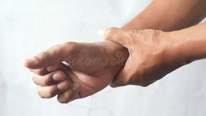Man Suffering Pain in Hand on Green Background Stock Footage - Video of ...