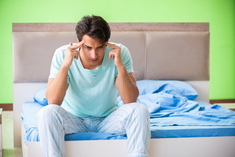 The Man Suffering from Sleeping Disorder and Insomnia Stock Photo ...