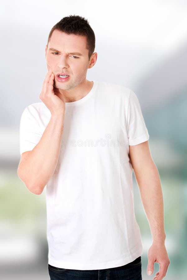 Man suffering tooth pain stock photo. Image of medical - 47069158