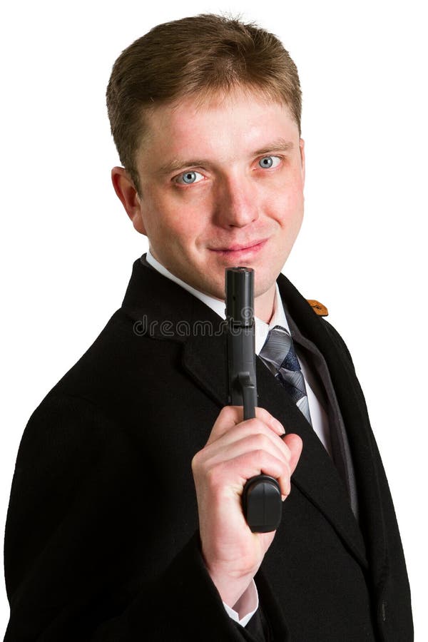 Man in a Suit Aims from a Pistol Stock Image - Image of gunman, face ...