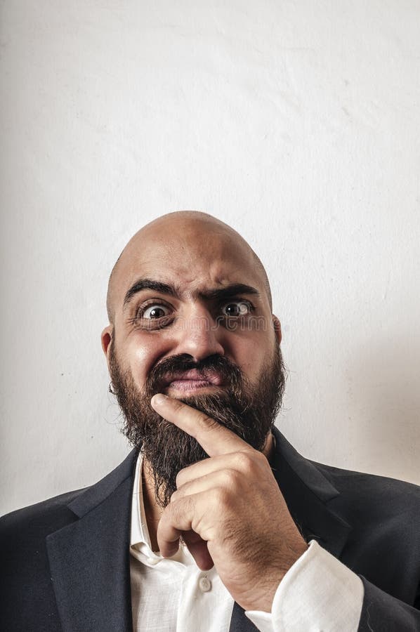 Man with a Suit and Beard and Strange Expressions Stock Image - Image ...