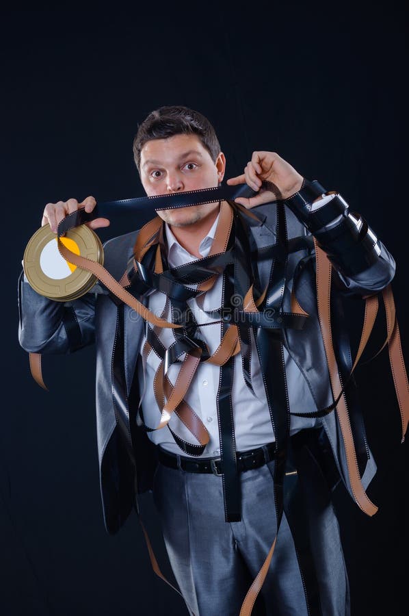 Man in a Suit with the Cine-film Stock Image - Image of cinema ...