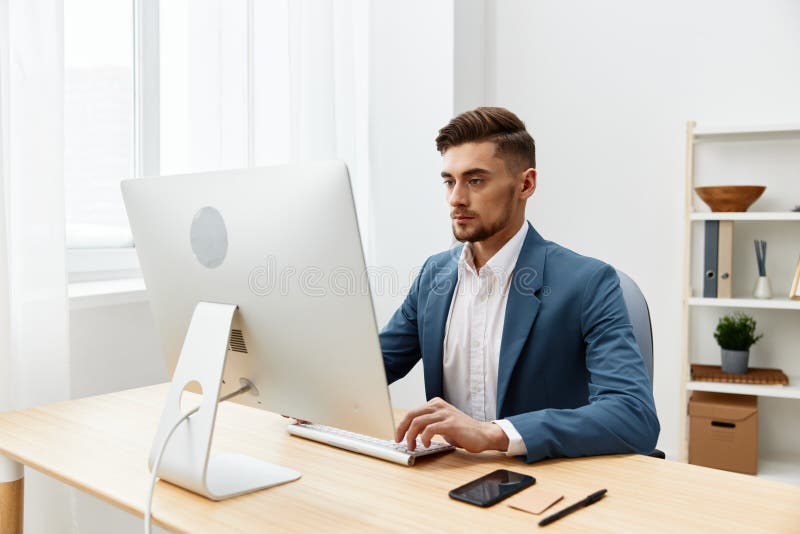 A Man in a Suit Computer Desktop Work Self-confidence Executive Stock ...