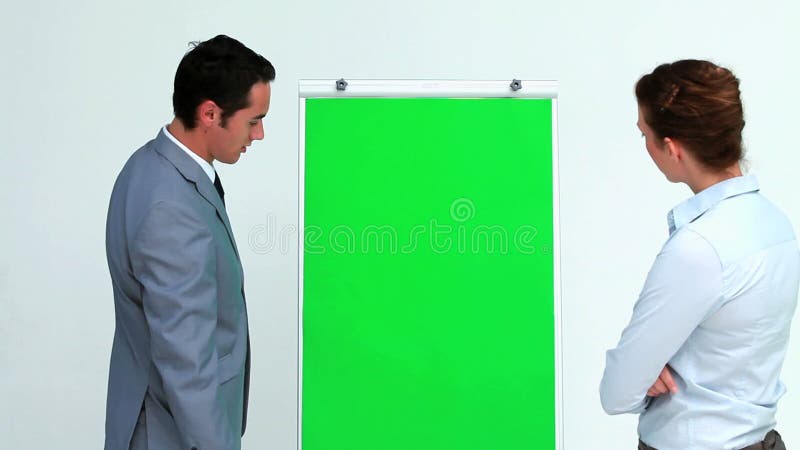 Man in Suit Explaining Something on a Board Stock Footage - Video of ...
