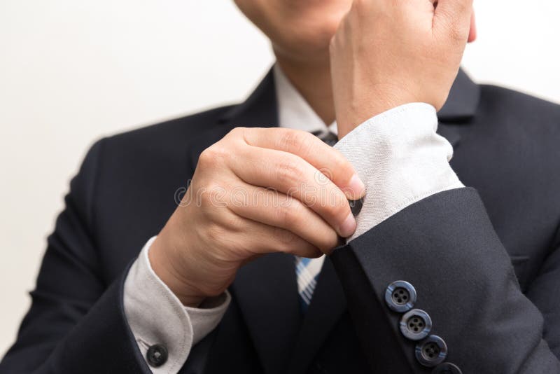 Man in Suit Fixing His Button Stock Image - Image of navy, outfit: 84447479