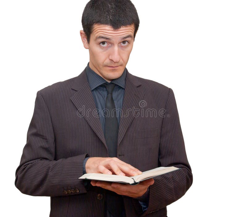 Man in Suit Holding an Open Book Stock Photo - Image of christianity ...