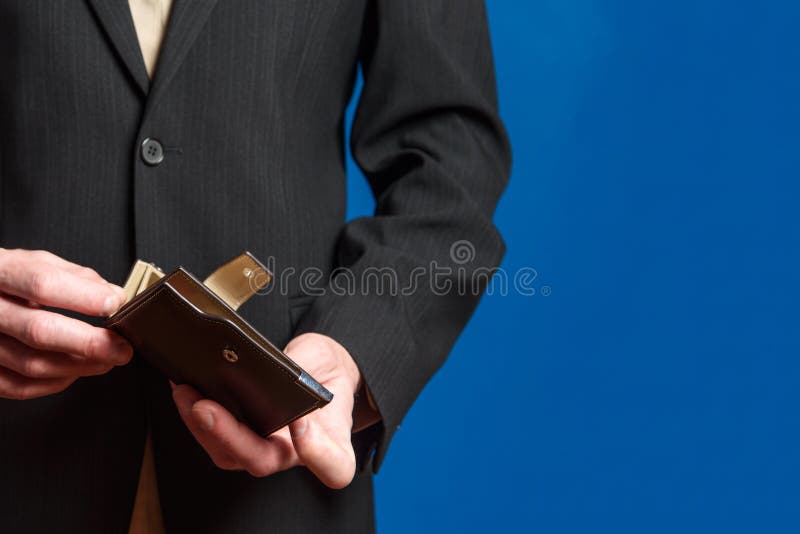 A Man in a Suit Holds a Wallet. Men& X27;s Hands Take Out or Put a Bill ...