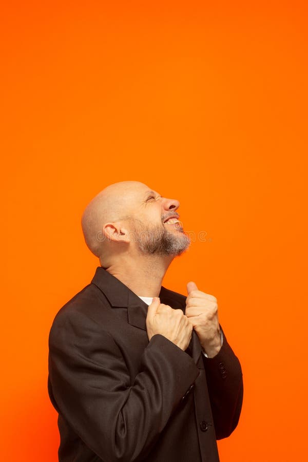Bald Man Looking at His Balding Head. Hair Transplant Concept Stock ...