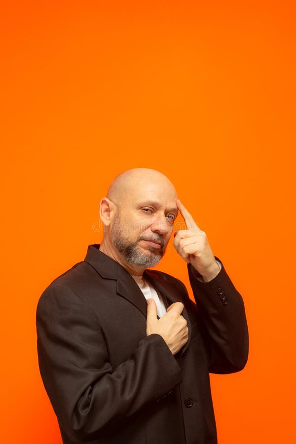 Man in Suit Jacket, Bearded and Bald Making Hand Gesture Stock Image ...