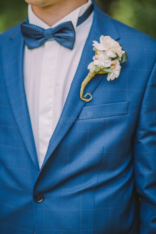 Man in a Suit Making a Statement with Boutonniere Stock Photo - Image ...