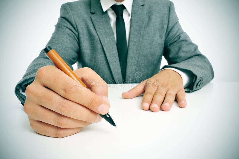 Man in Suit with a Pen in His Hand Ready To Write Stock Image - Image ...
