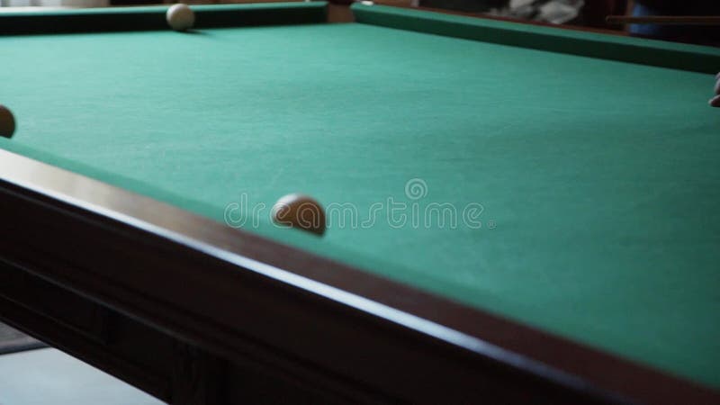 Man in Suit Plays Billiards in Dark Room on Pool Table Stock Footage ...