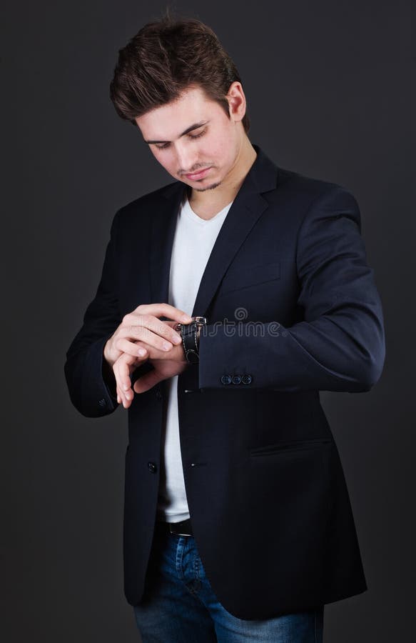 Man in Suit Pointing at Watch Stock Photo - Image of attractive ...