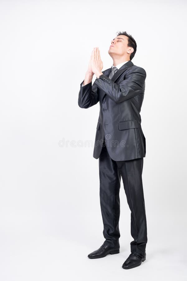 Man in suit praying stock photo. Image of lonely, desperate - 178601174