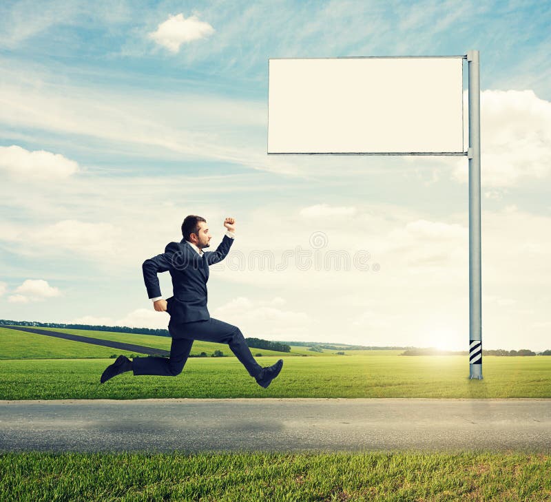 Man in Suit Running Fast on the Road Stock Photo - Image of hurry, road ...